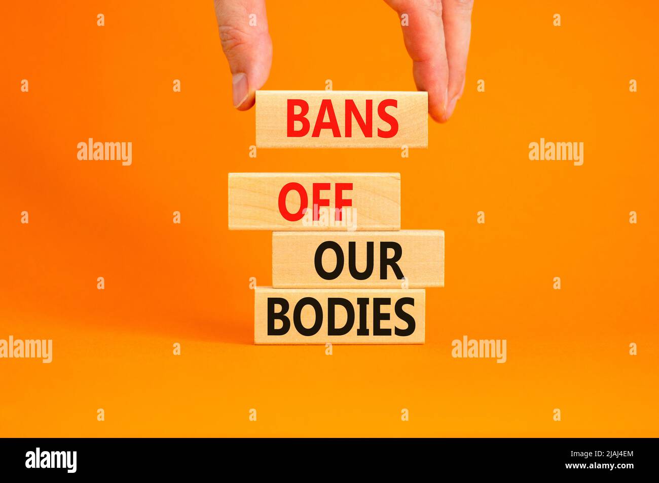 Bans off our bodies symbol. Concept words Bans off our bodies on wooden ...