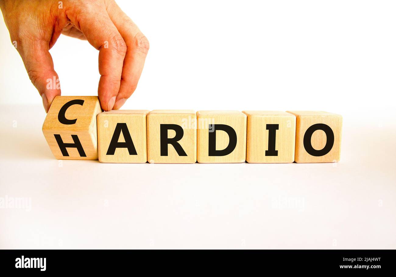 Cardio or hardio symbol. Businessman turns wooden cubes and changes ...