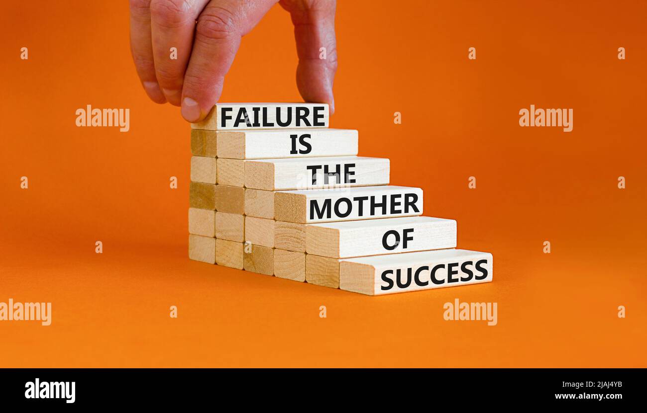 Failure or success symbol. Wooden blocks with words A failure is the ...
