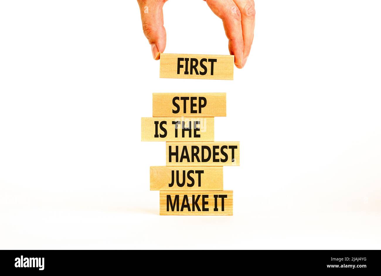 Make first step symbol. Wooden blocks with words First step is the ...