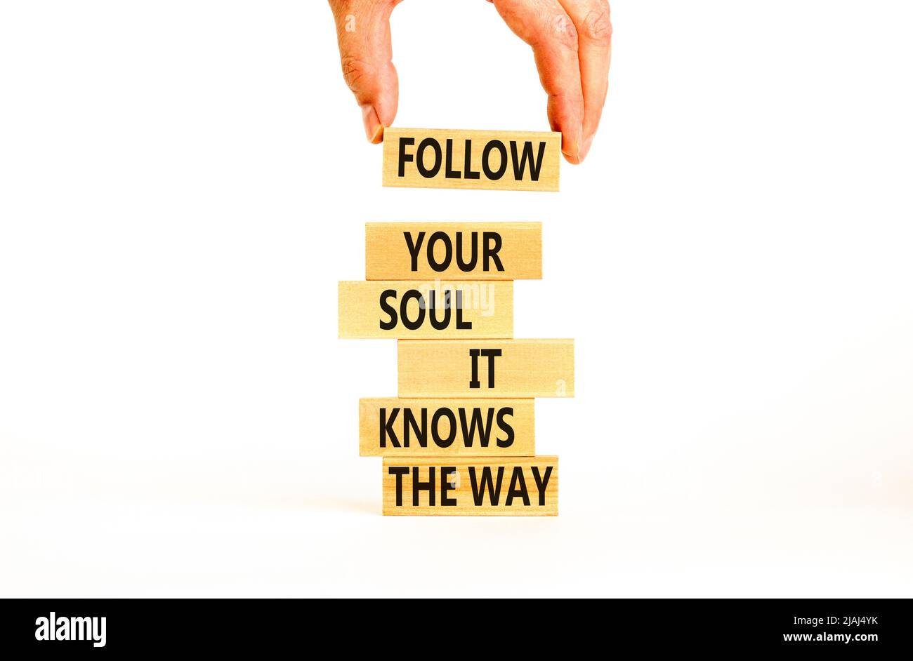 Motivation and inspiration symbol. Wood blocks with words Follow your ...