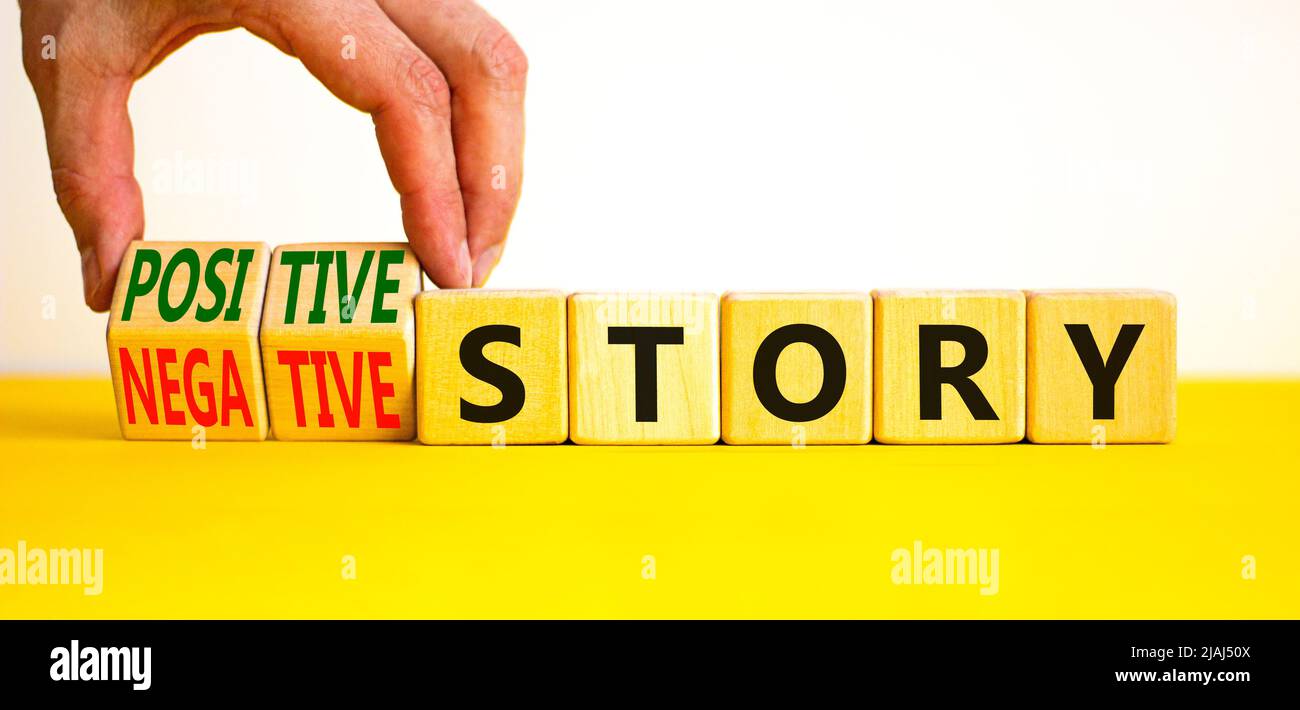 Positive or negative story symbol. Businessman turns cubes, changes ...