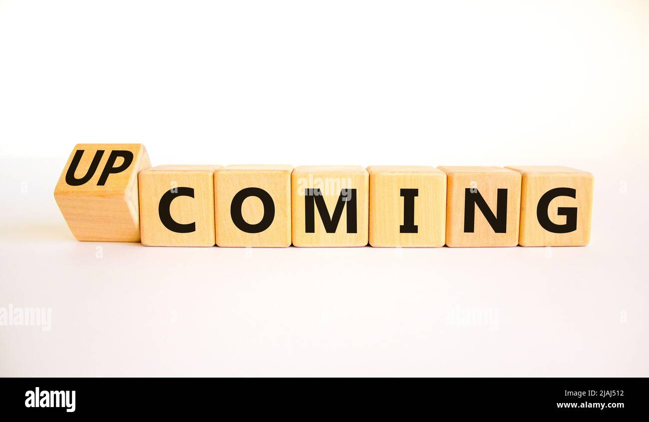 Coming or upcoming symbol. Turned wooden cubes and changed the word ...