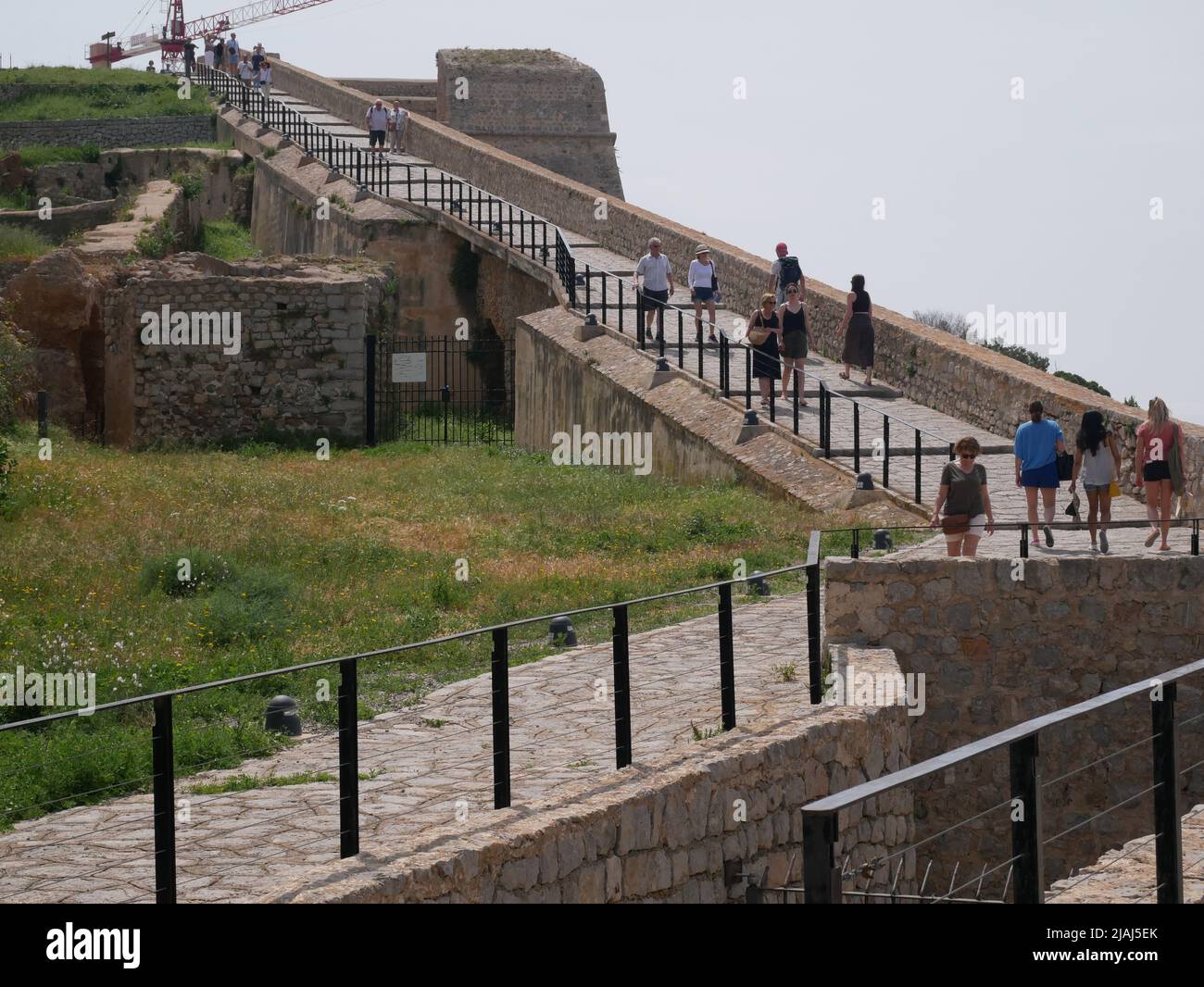 Tourists on the Castle Wall, Ibiza Town, Ibiza Stock Photo - Alamy