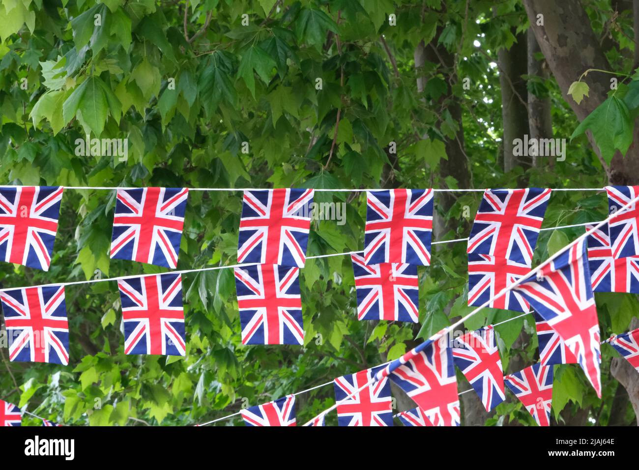 British flags hanging on the streets of London. Union jack flag ...