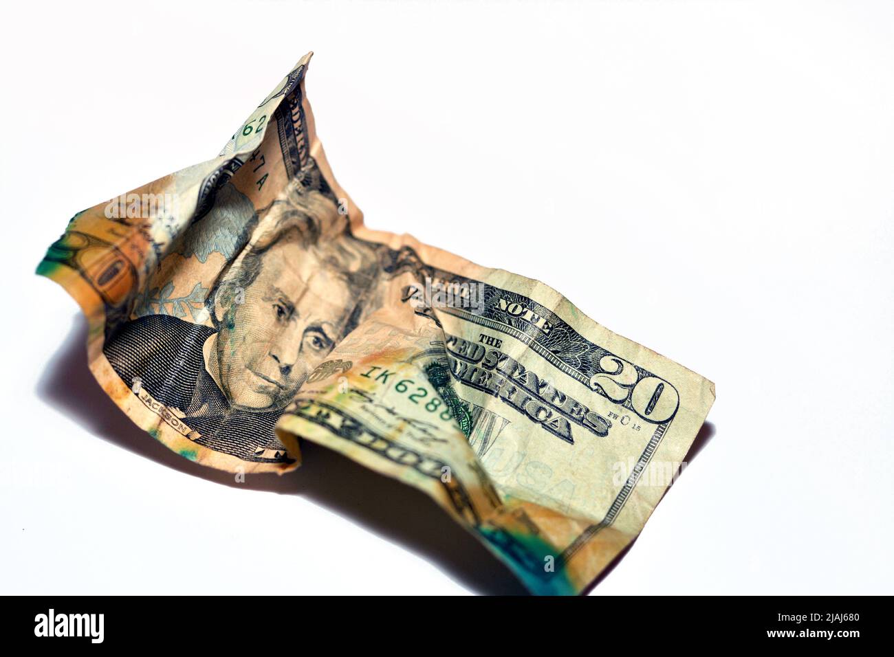 Selective focus of crumpled obverse American money of 20 $ twenty ...