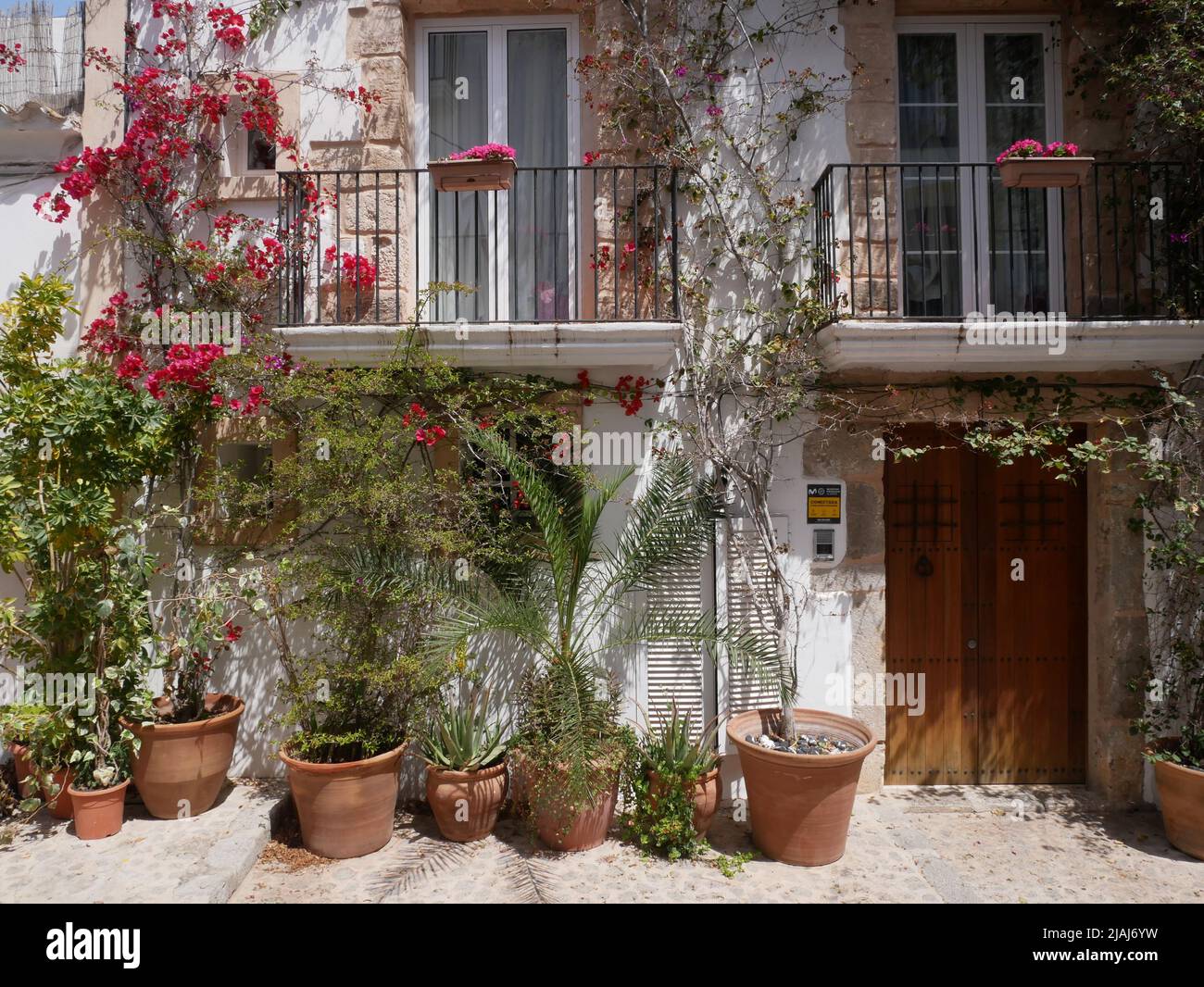 Exploring the back streets of the Old Town in Ibiza Town, Ibiza Stock ...
