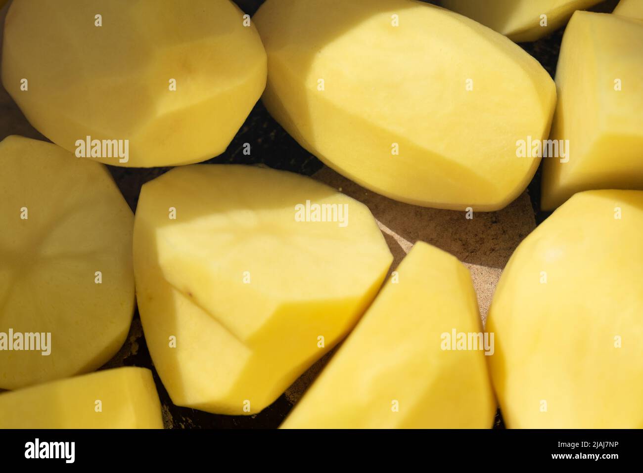 Peeled potatoes in cold water. Peeled potatoes for cooking. Potato ...