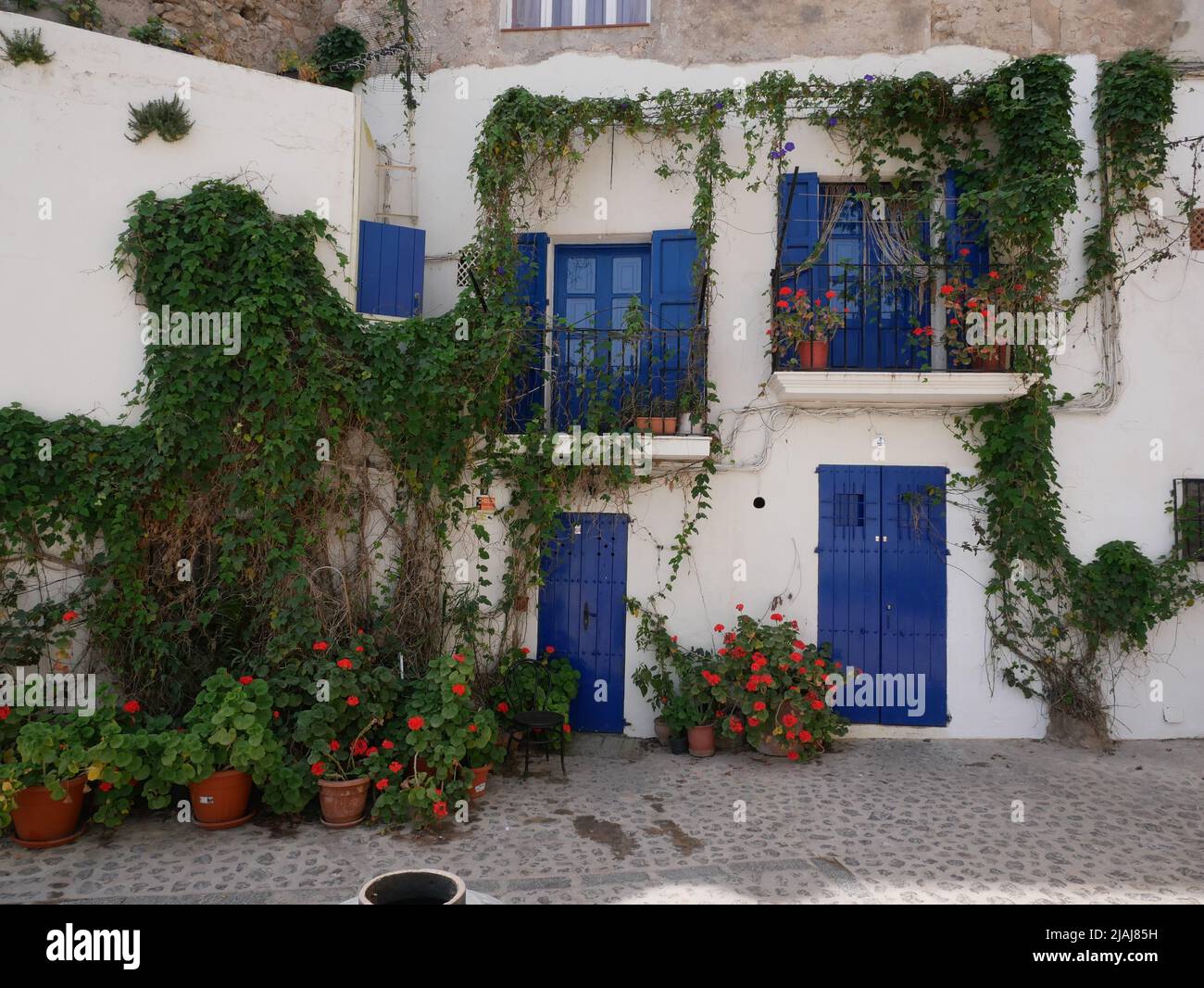Exploring the back streets of the Old Town in Ibiza Town, Ibiza Stock ...