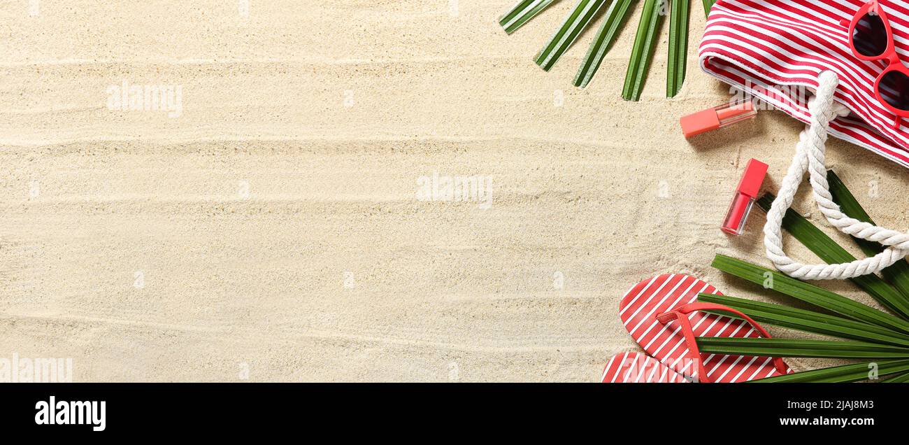 Set of beach accessories and tropical leaves on sand. Banner for design ...