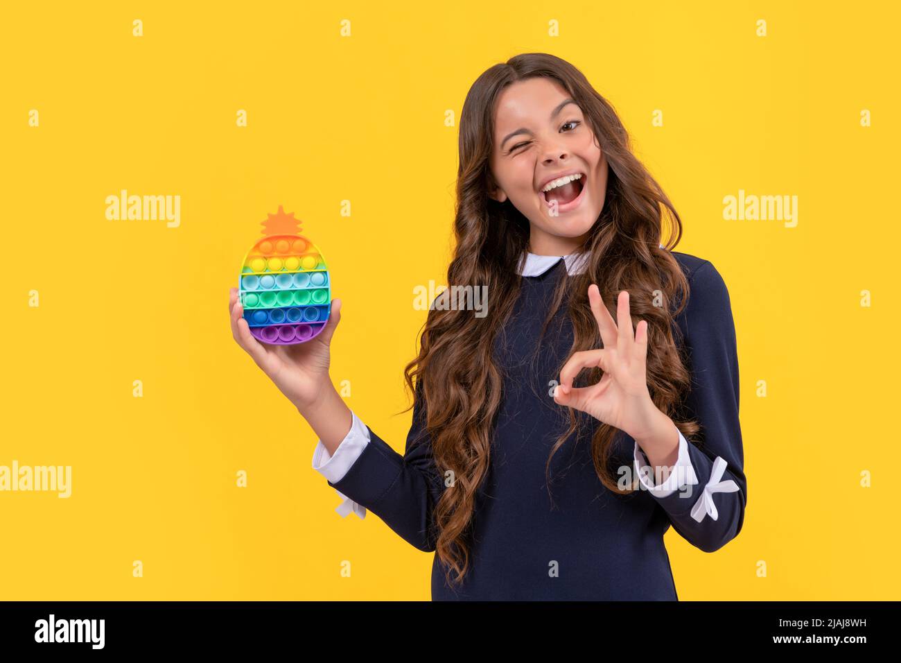 ok. happy child play with bright popit fidget. push button antistress ...
