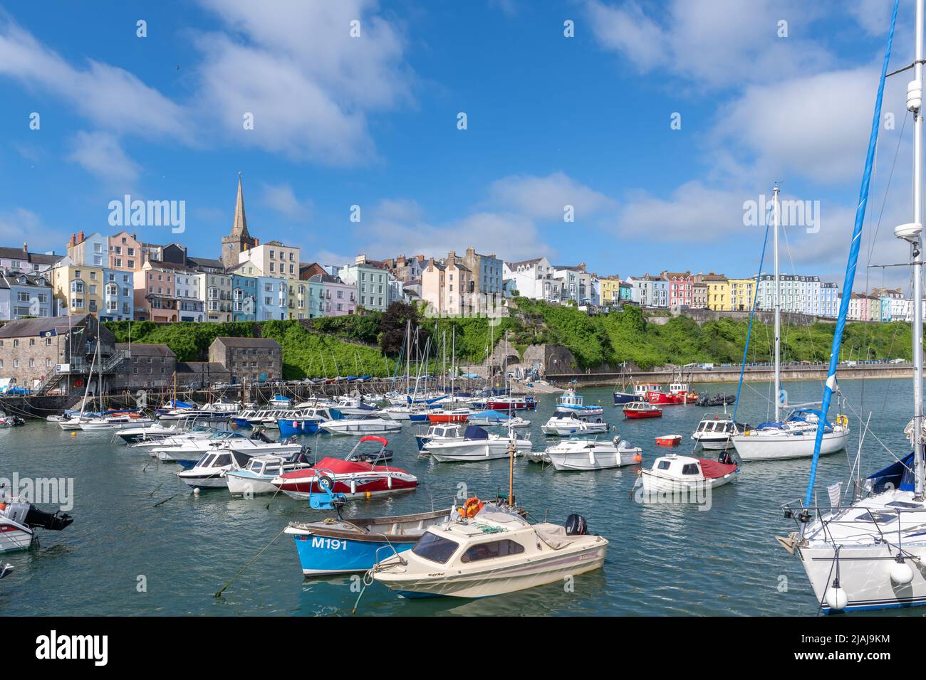 The pretty harbour of Tenby Pembrokeshire with its many small boats ...