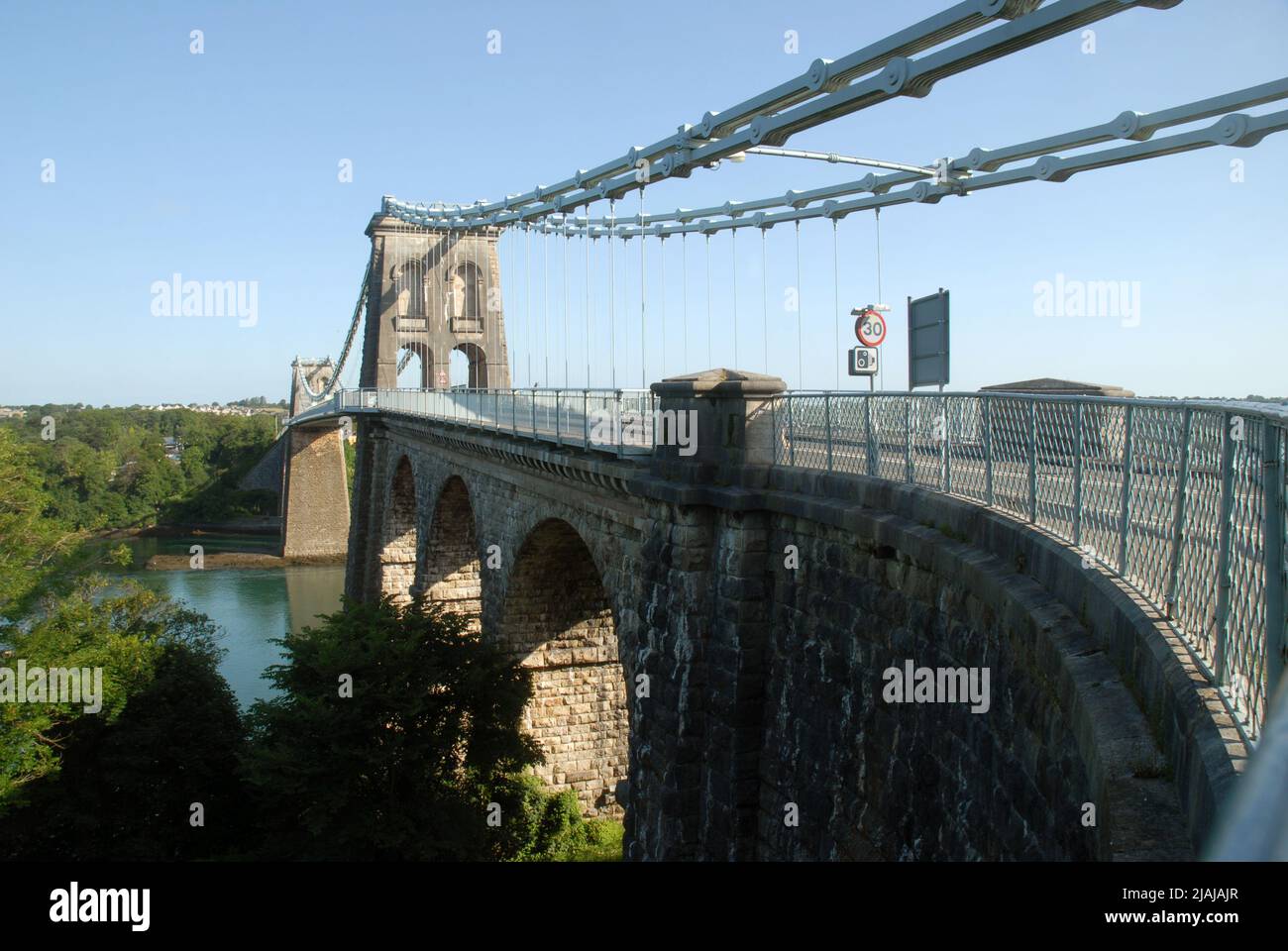 The Menai Suspension Bridge, designed by Thomas Telford, looking across ...