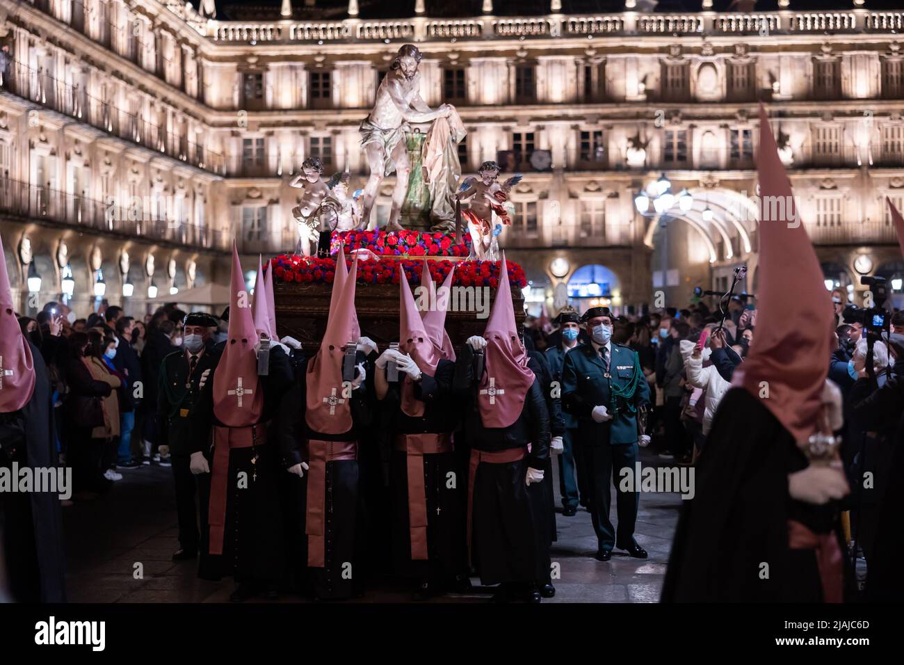 Religious brotherhood carrying paso of Flagellated Jesus during Holy ...