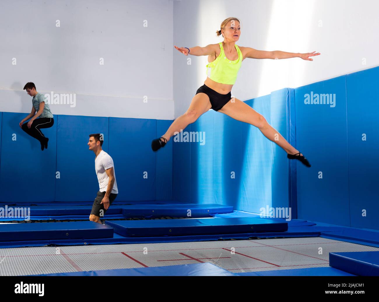 People jumping in trampoline center Stock Photo - Alamy