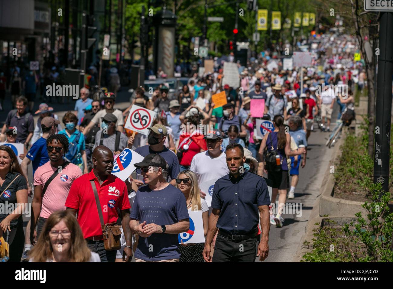 Protesters marching against Bill-96 during the demonstration ...