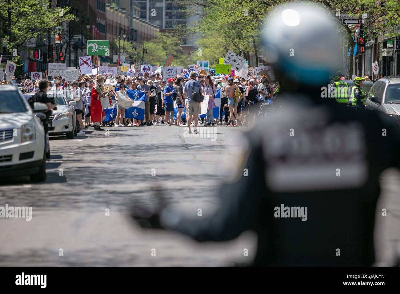 Protesters hold placards expressing their opinion during the ...