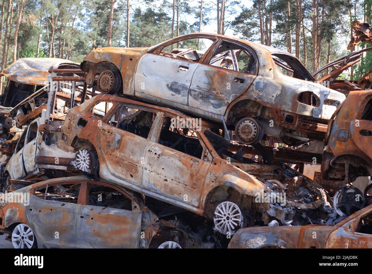 war in ukraine. Car graveyard. Shot cars of civilians. russia's war ...