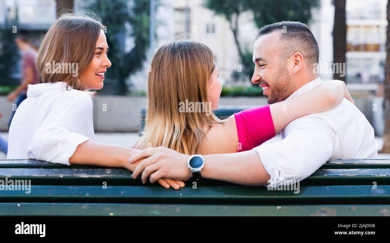 Image of the love triangle between young people outdoor Stock Photo - Alamy