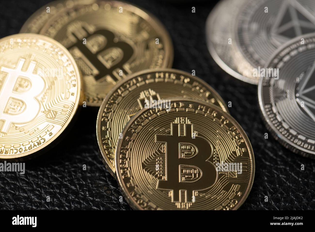 Bitcoin and ethereum coins on black background. Digital currency on ...
