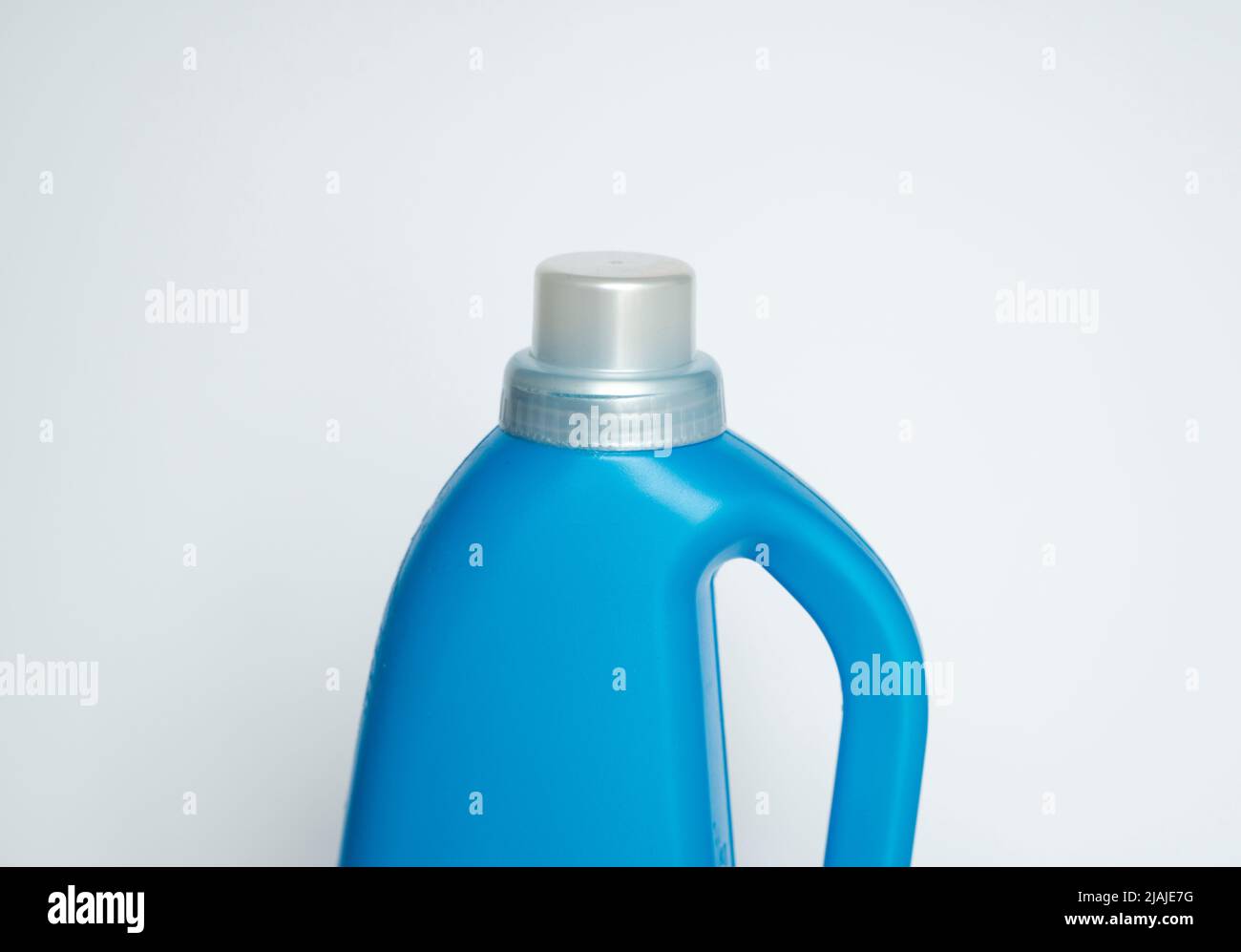 Softener in blue plastic bottle isolated on white background. Bottle ...