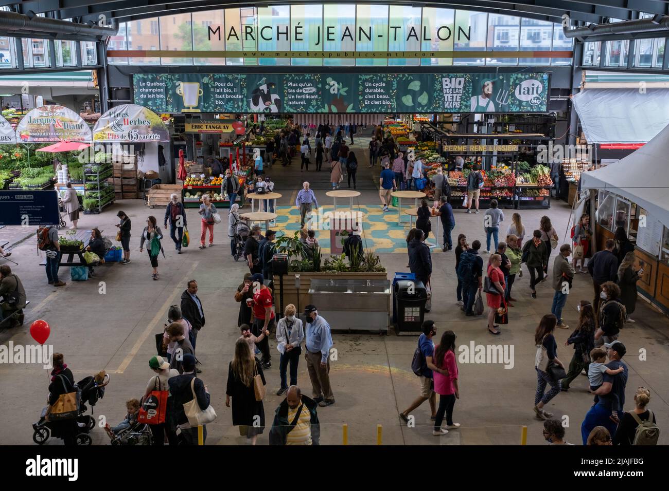 Montreal, CA, 28 May 2022: People buy groceries at Jean-Talon Market ...