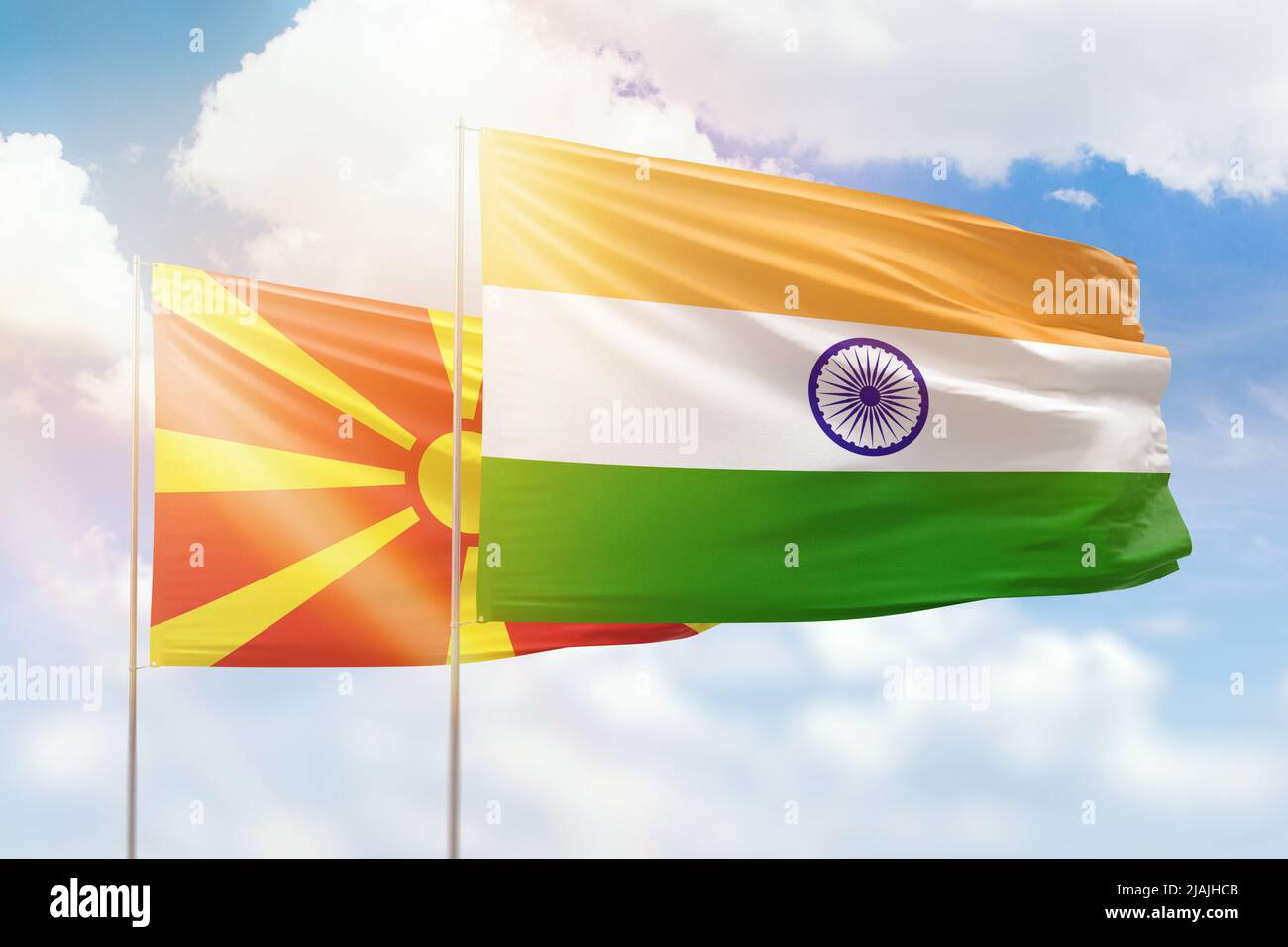 Sunny blue sky and flags of india and north macedonia Stock Photo - Alamy