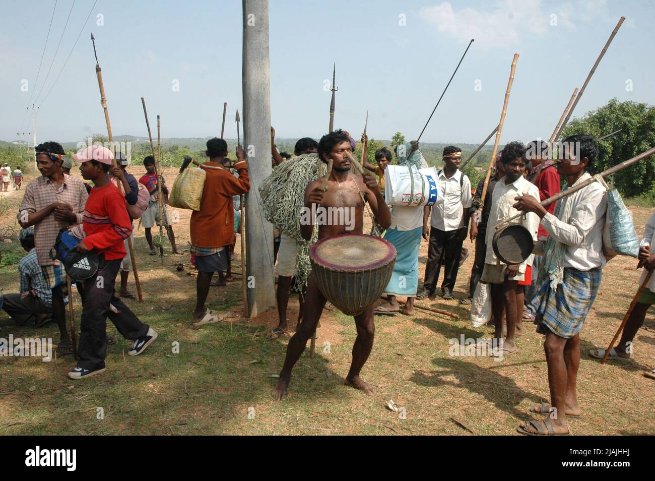 Tribal men dancing during a hunting festival in the Ayodhya hills of ...