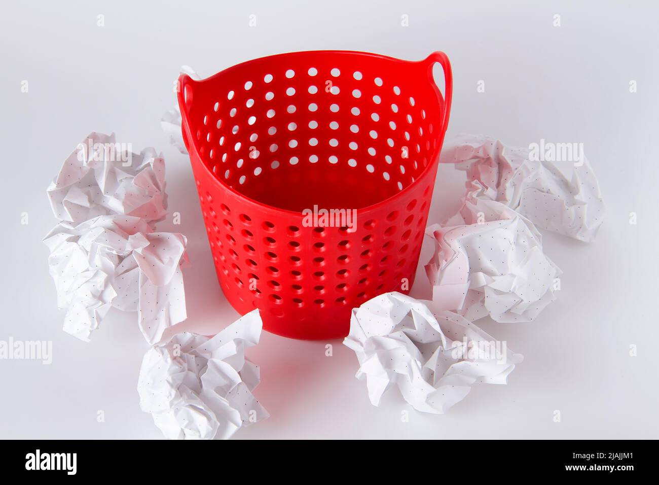 Trash can. Full basket. Crumpled paper in a basket. A mountain of ...