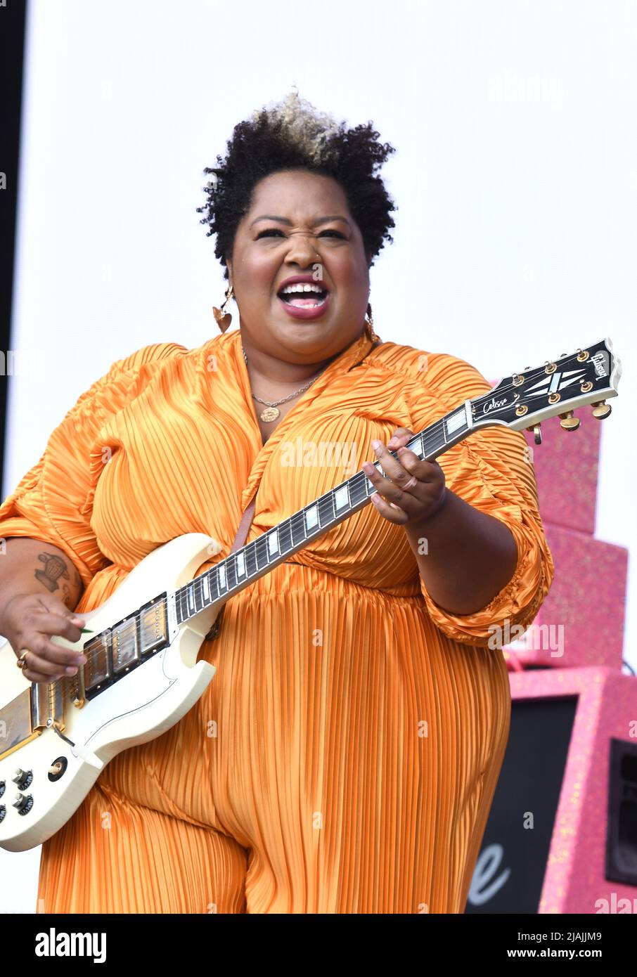 Singer, songwriter and guitarist Celisse is shown performing on stage ...