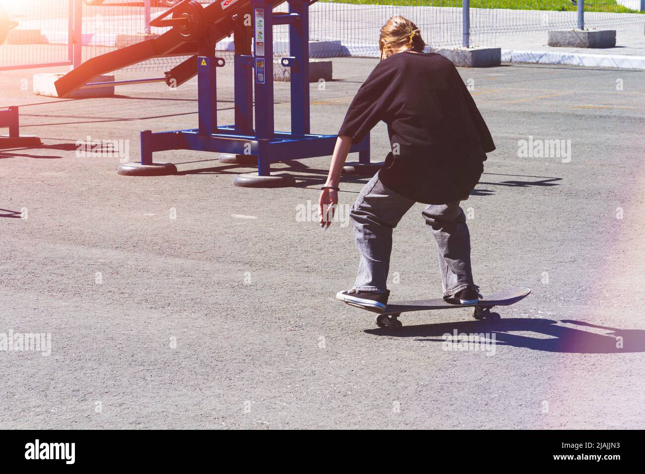 Skateboarding on the track. Tricks on a skateboard. Area for skiing ...