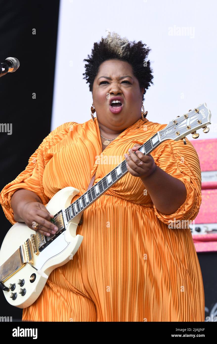 Singer, songwriter and guitarist Celisse is shown performing on stage ...