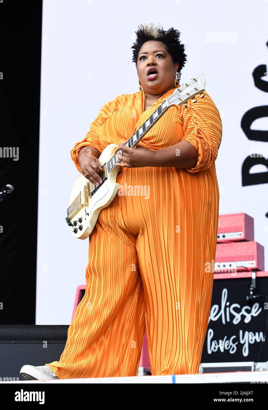 Singer, songwriter and guitarist Celisse is shown performing on stage ...