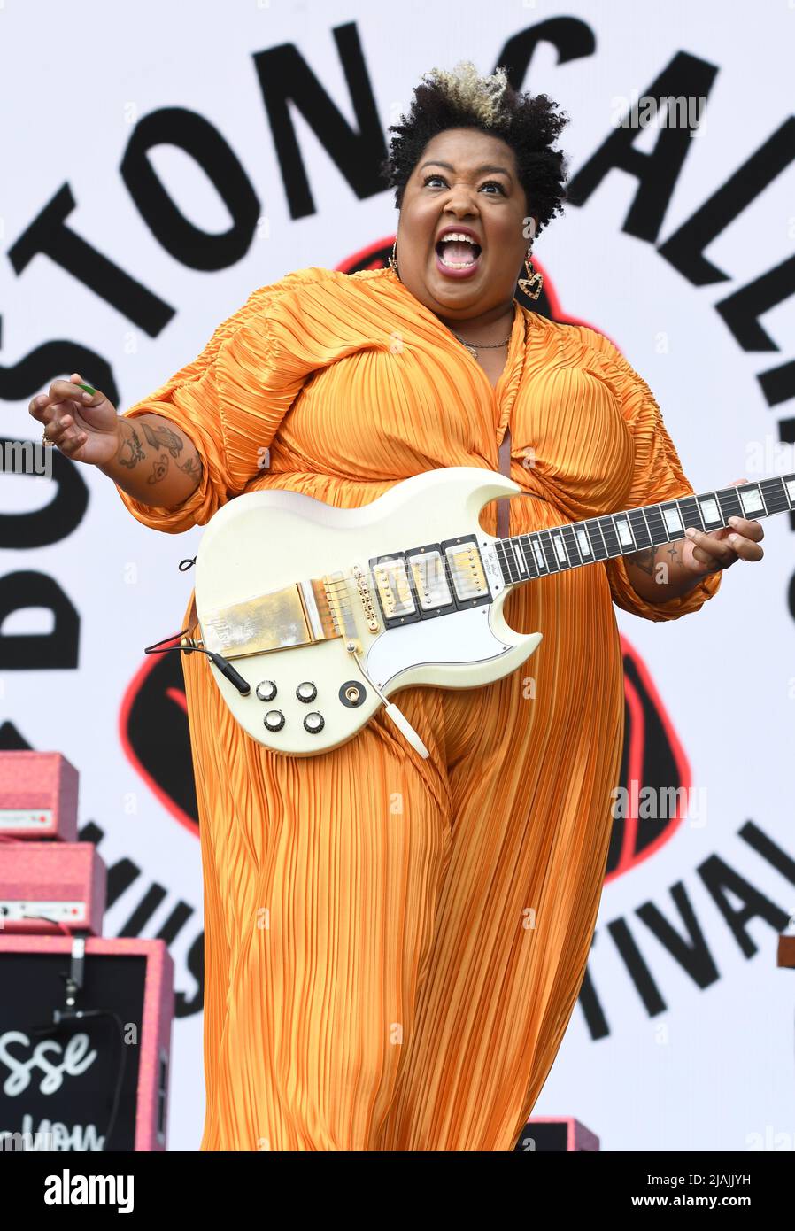 Singer, songwriter and guitarist Celisse is shown performing on stage ...
