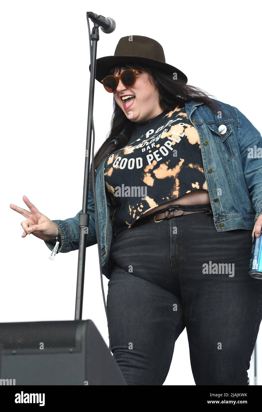 Singer Julie Rhodes is shown performing on stage during a live concert ...