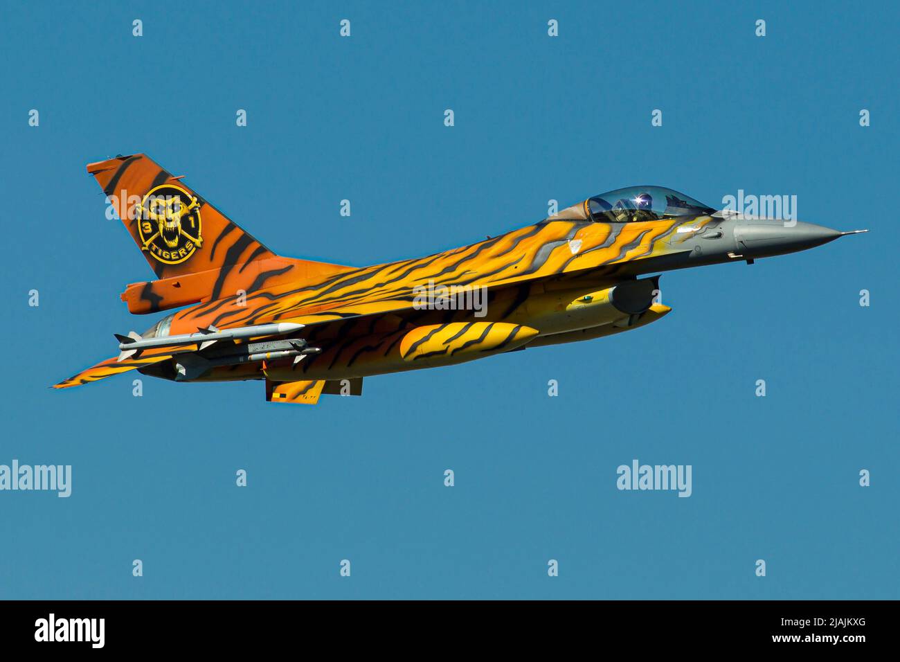 A Belgian Air Component F-16 Fighting Falcon in flight, painted in ...