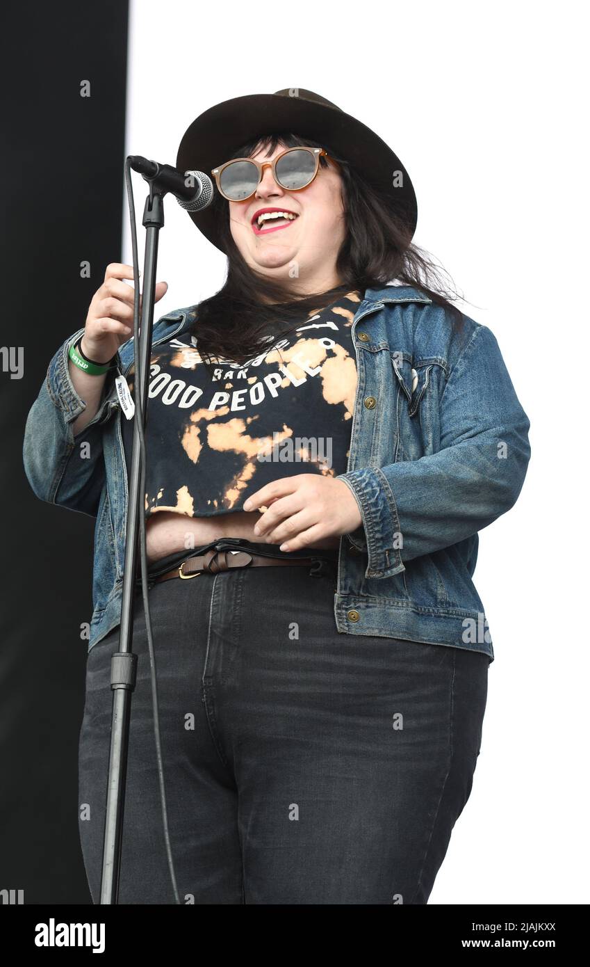 Singer Julie Rhodes is shown performing on stage during a live concert ...