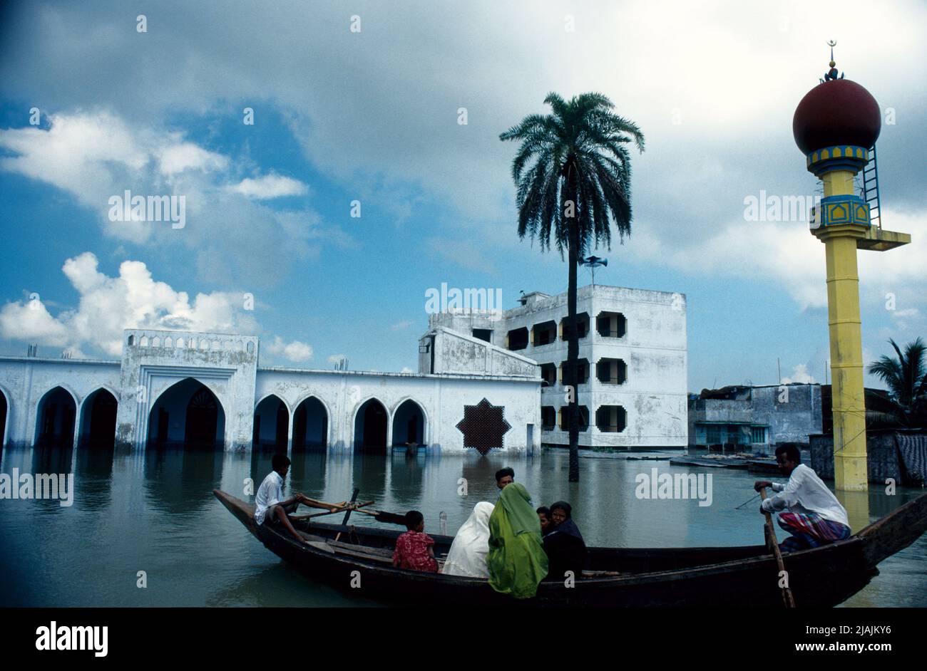 People ferrying on flood water at Aminbazar in Dhaka, Bangladesh ...