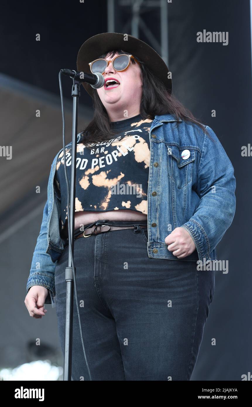 Singer Julie Rhodes is shown performing on stage during a live concert ...