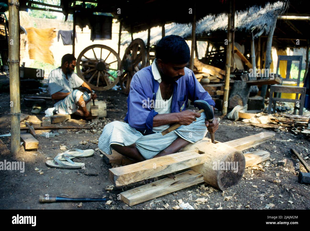 Rural craftsmen making wooden wheels for bullock cart at Meherpur ...
