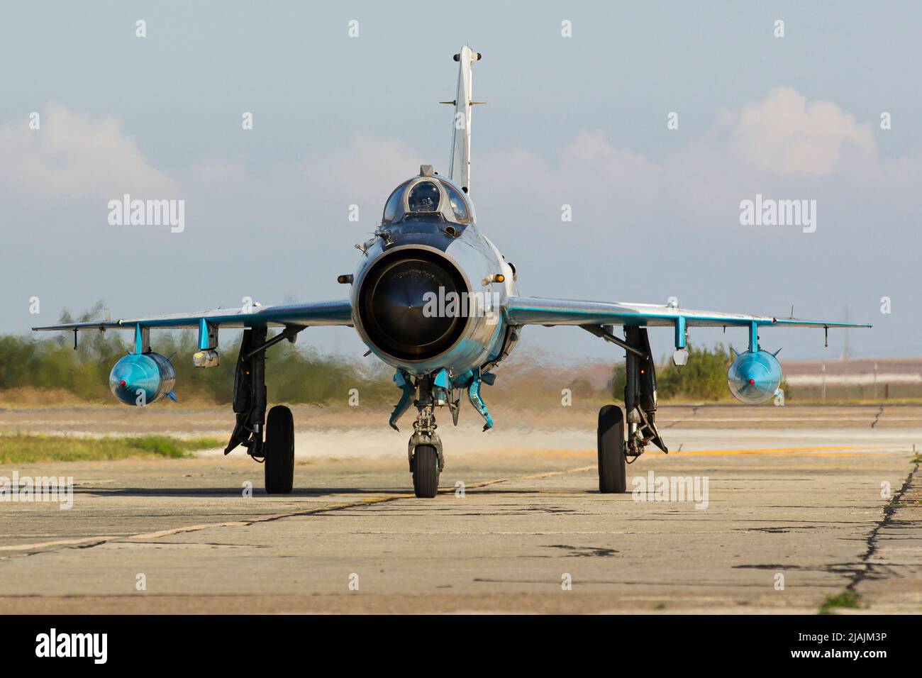A Romanian Air Force MiG-21 LanceR turning off the runway after landing ...