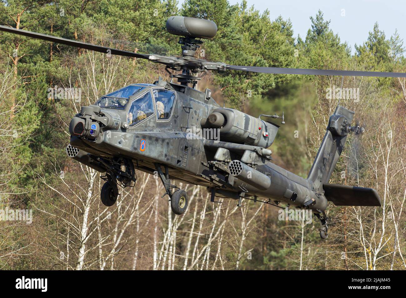 A U.S. Army AH-64 Apache attack helicopter takes off from Grafenwohr ...