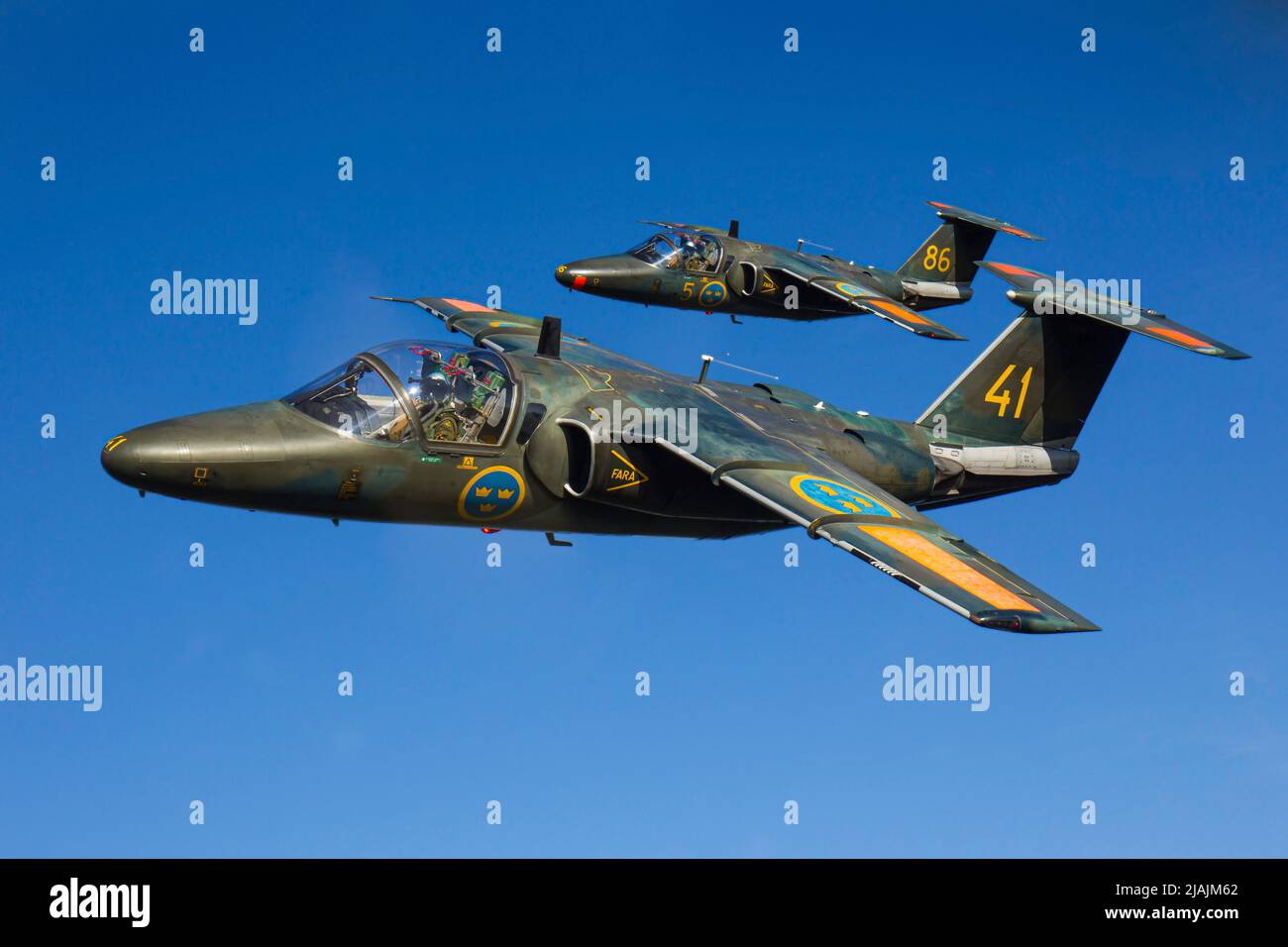 A pair of Swedish Air Force Sk60 training jets on a formation flight ...