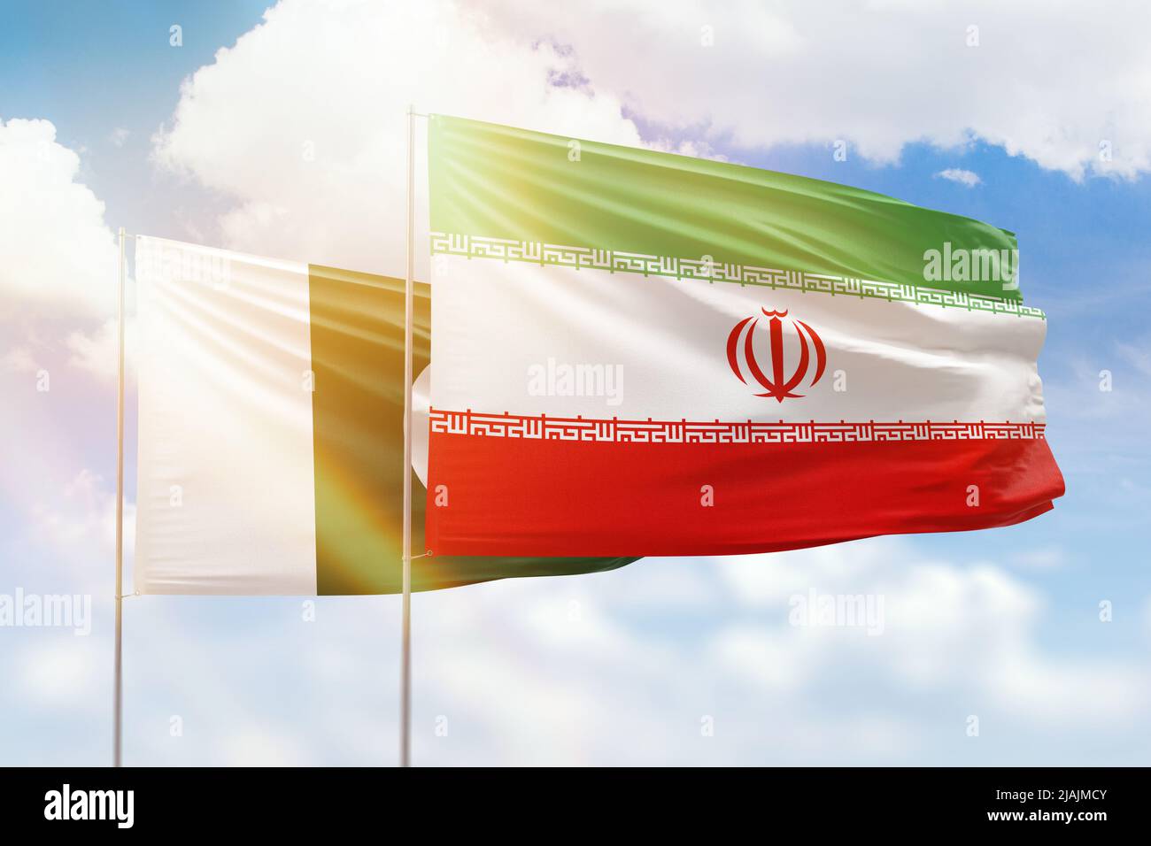 Sunny blue sky and flags of iran and pakistan Stock Photo - Alamy