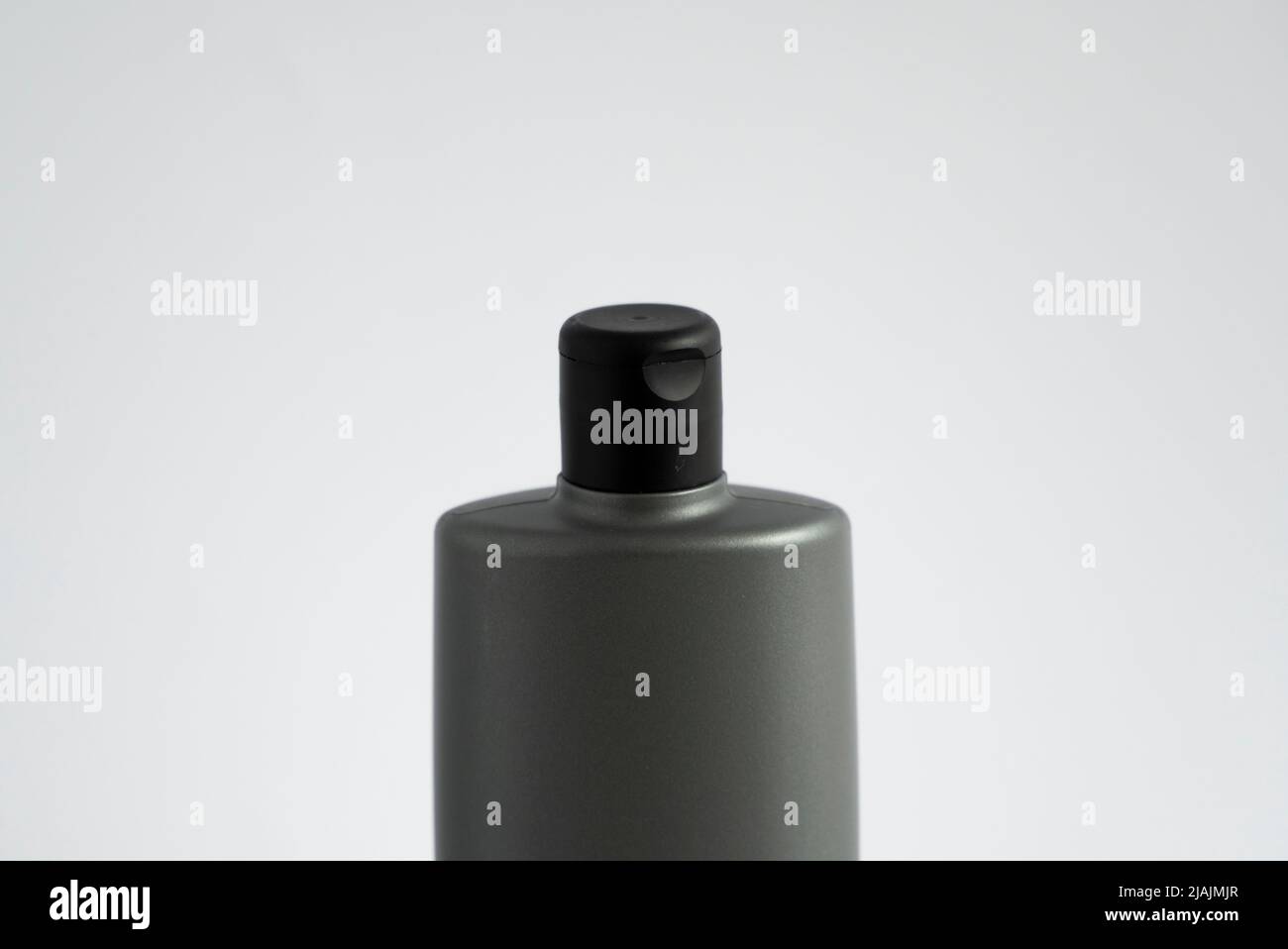 Black shampoo packaging mockup. Vertical empty plastic cosmetic package ...