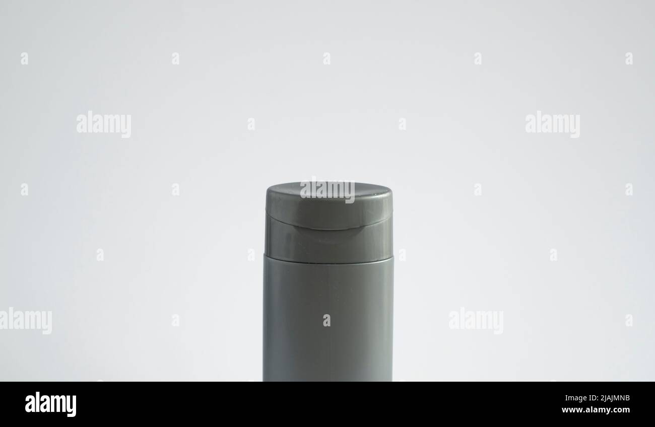 Black shampoo packaging mockup. Vertical empty plastic cosmetic package ...