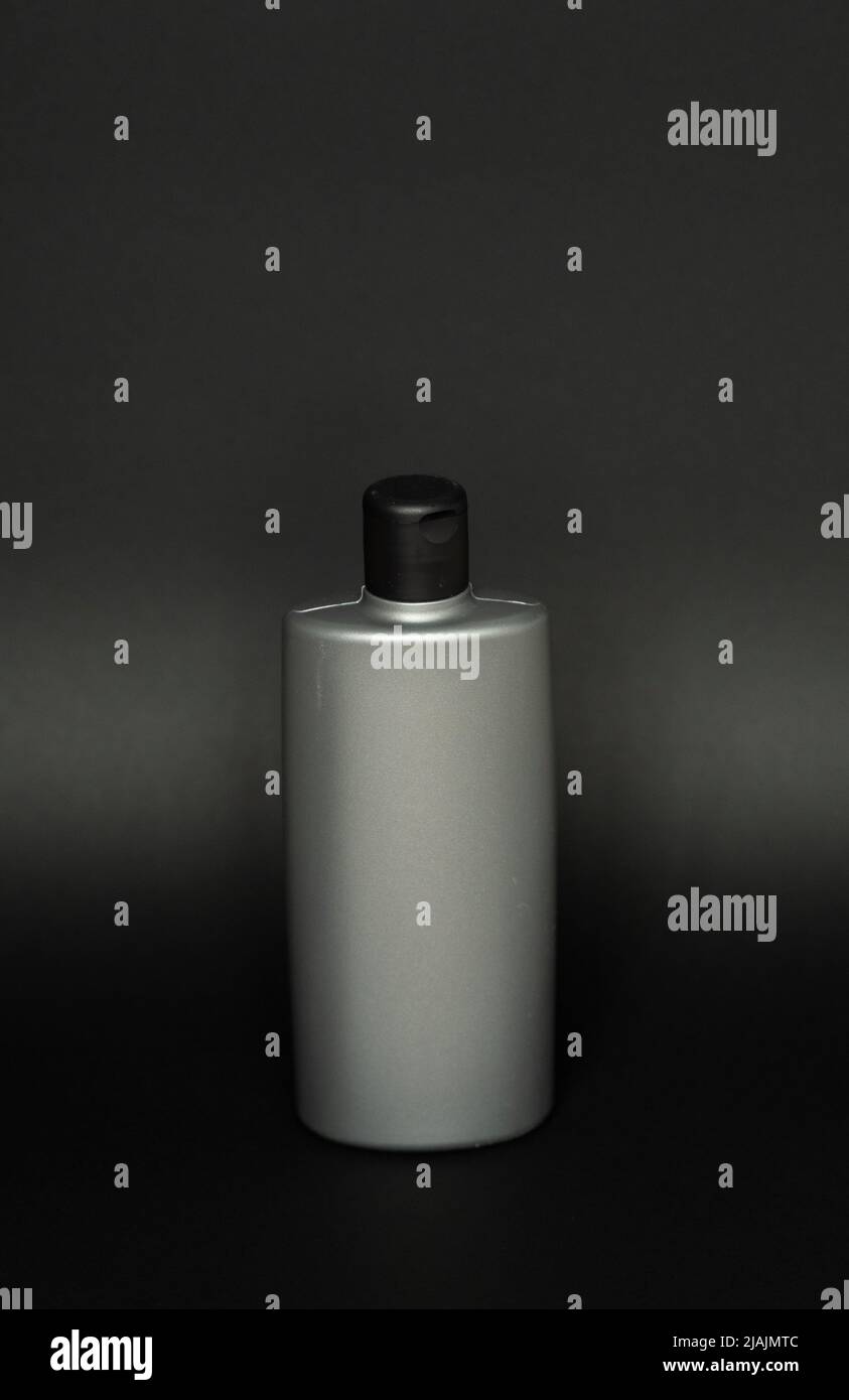 Black shampoo packaging mockup. Vertical empty plastic cosmetic package ...
