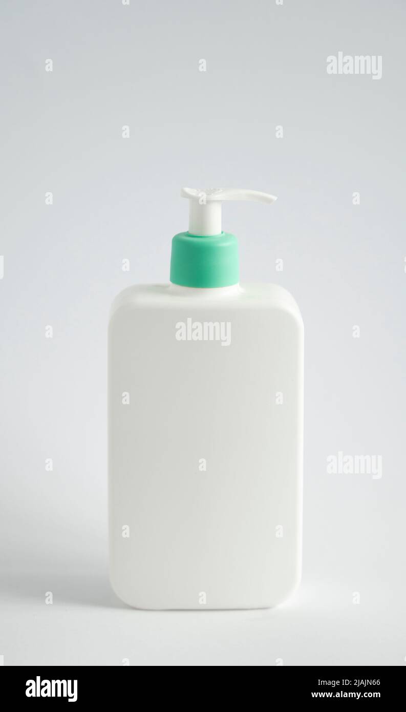 Large white plastic bottle with pump dispenser as a liquid container ...