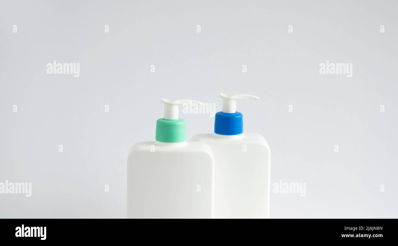 Two liquid containers for gel, lotion, cream, shampoo, bath foam ...