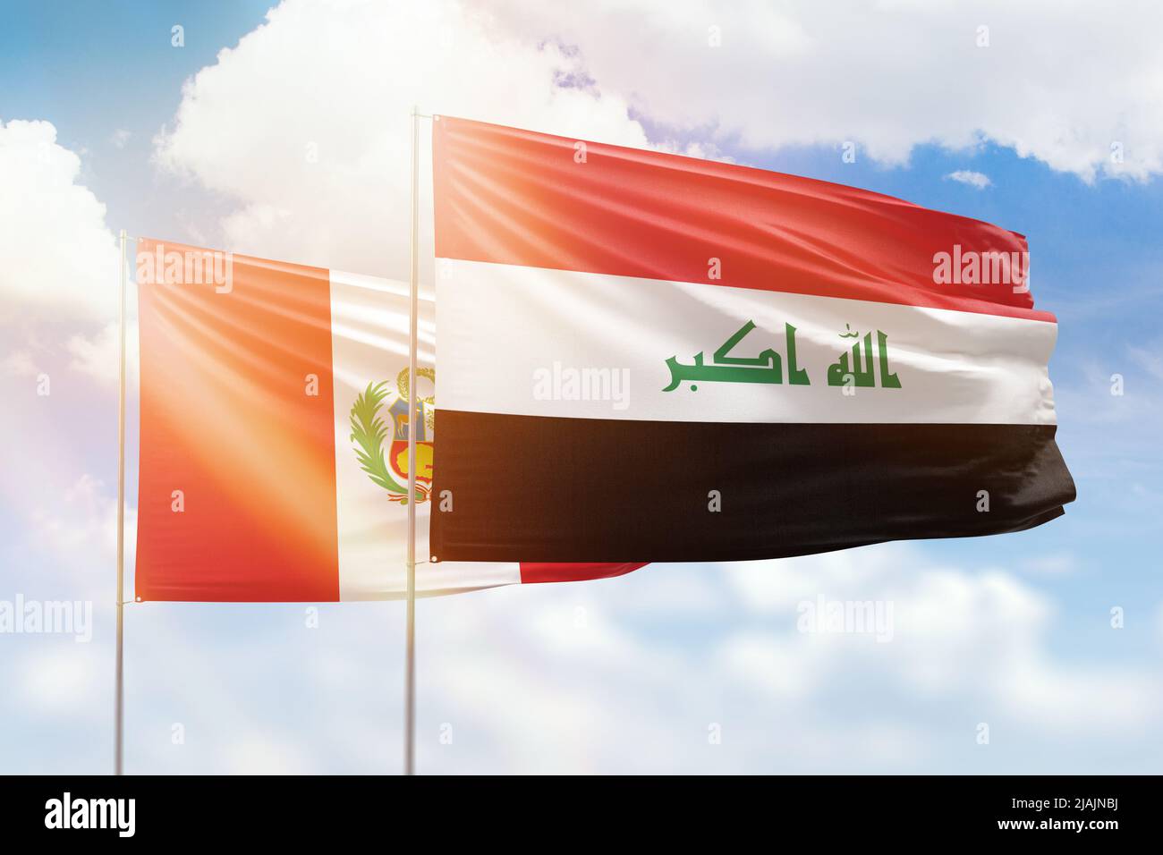 Sunny blue sky and flags of iraq and peru Stock Photo - Alamy